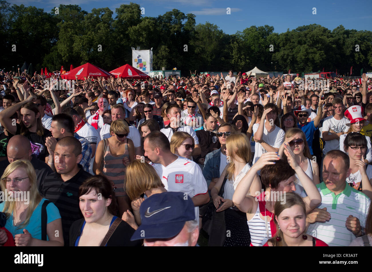 KRAKOW,POLAND -JUNE,8: Polish fans follow their team in the opening ...