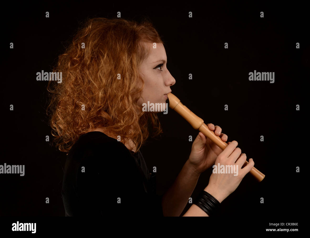 Woman playing recorder hi-res stock photography and images - Alamy