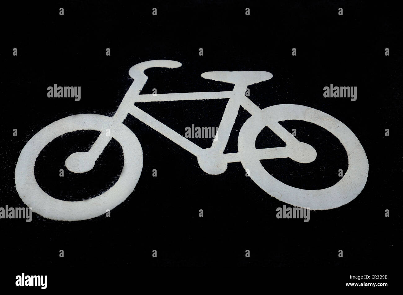 Bicycle lane, bicycle pictogram painted on ground Stock Photo - Alamy