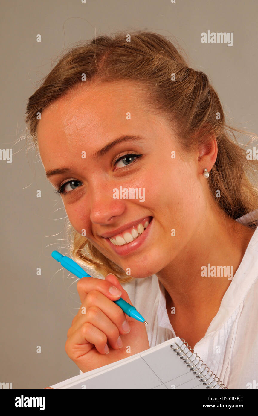 Smiling young woman, secretary Stock Photo - Alamy