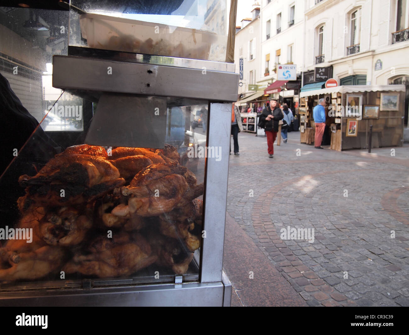 Roasted chickens for sale at a shop on Rue Cler, Paris, France, May 13 ...