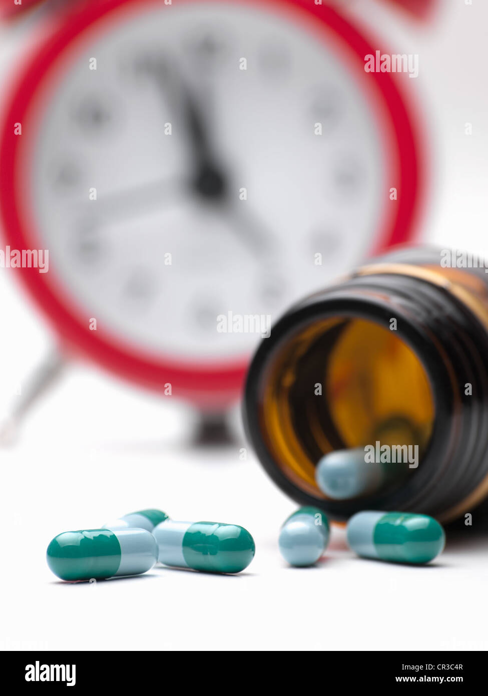 Pills and clock over white background,closeup, for health care,medicine ...