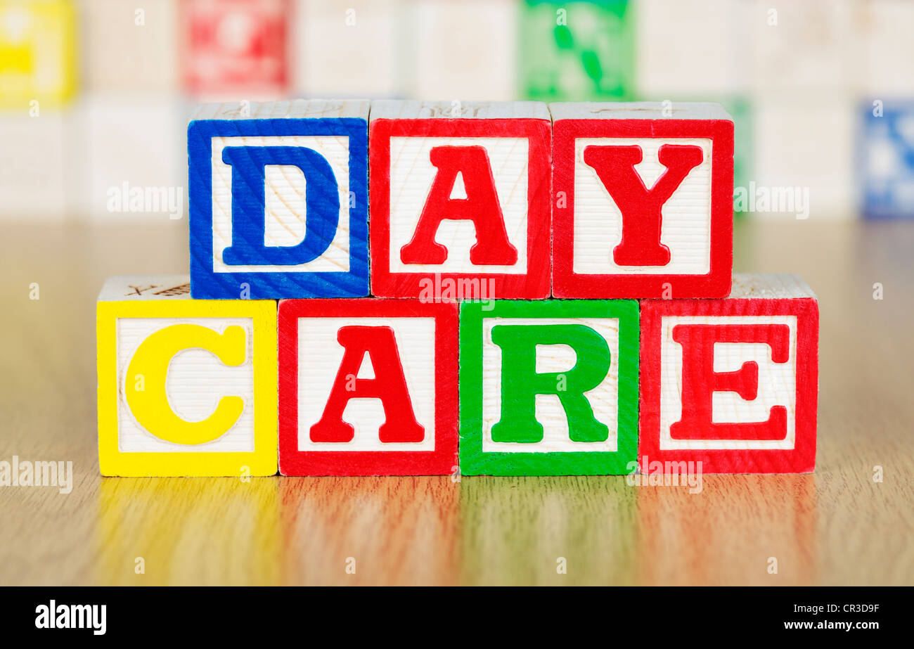 Day Care Spelled Out in Alphabet Building Blocks Stock Photo - Alamy