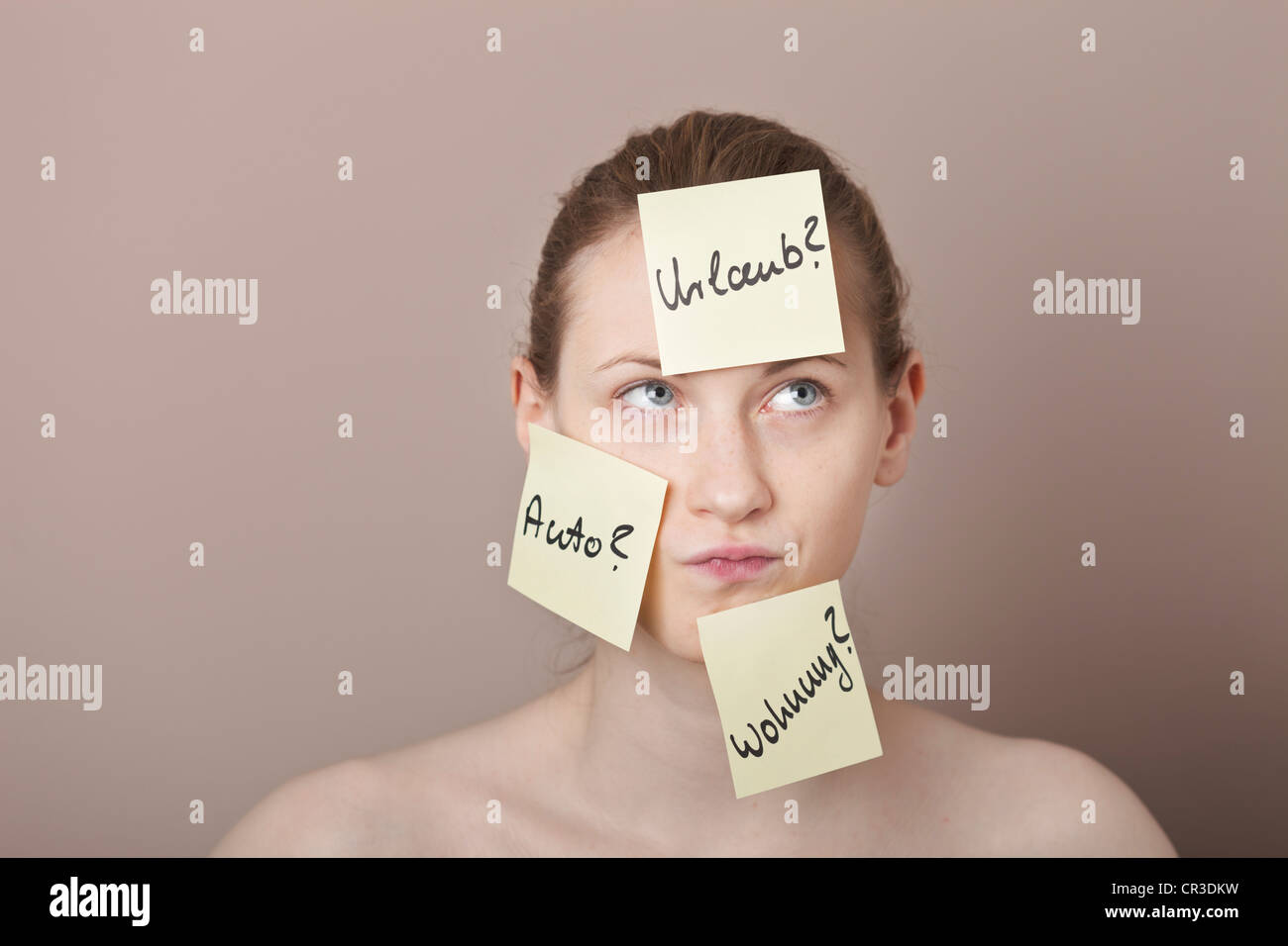 Post-It notes written in German with buying options, sticking to the ...