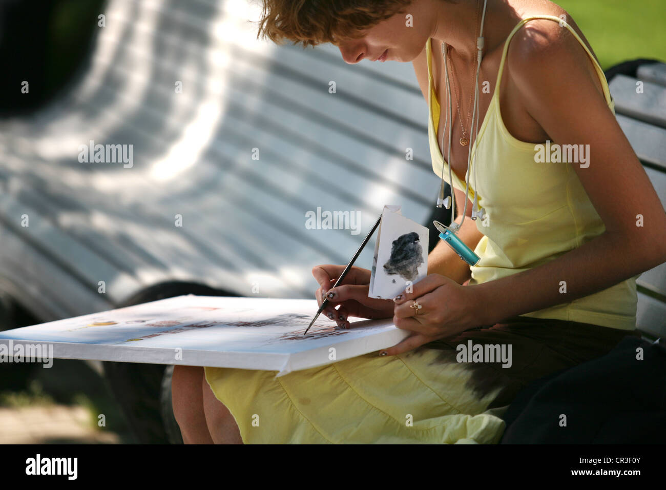 Drawing girl in park Stock Photo - Alamy