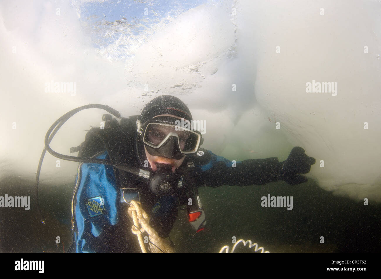 Diver, subglacial diving, ice diving, in the frozen Black Sea, a rare ...