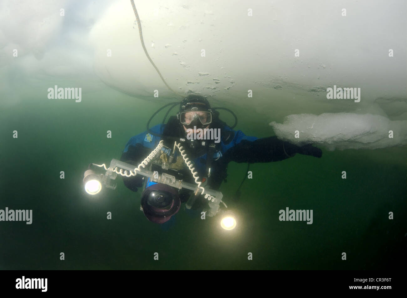 Diver, subglacial diving, ice diving, in the frozen Black Sea, a rare ...