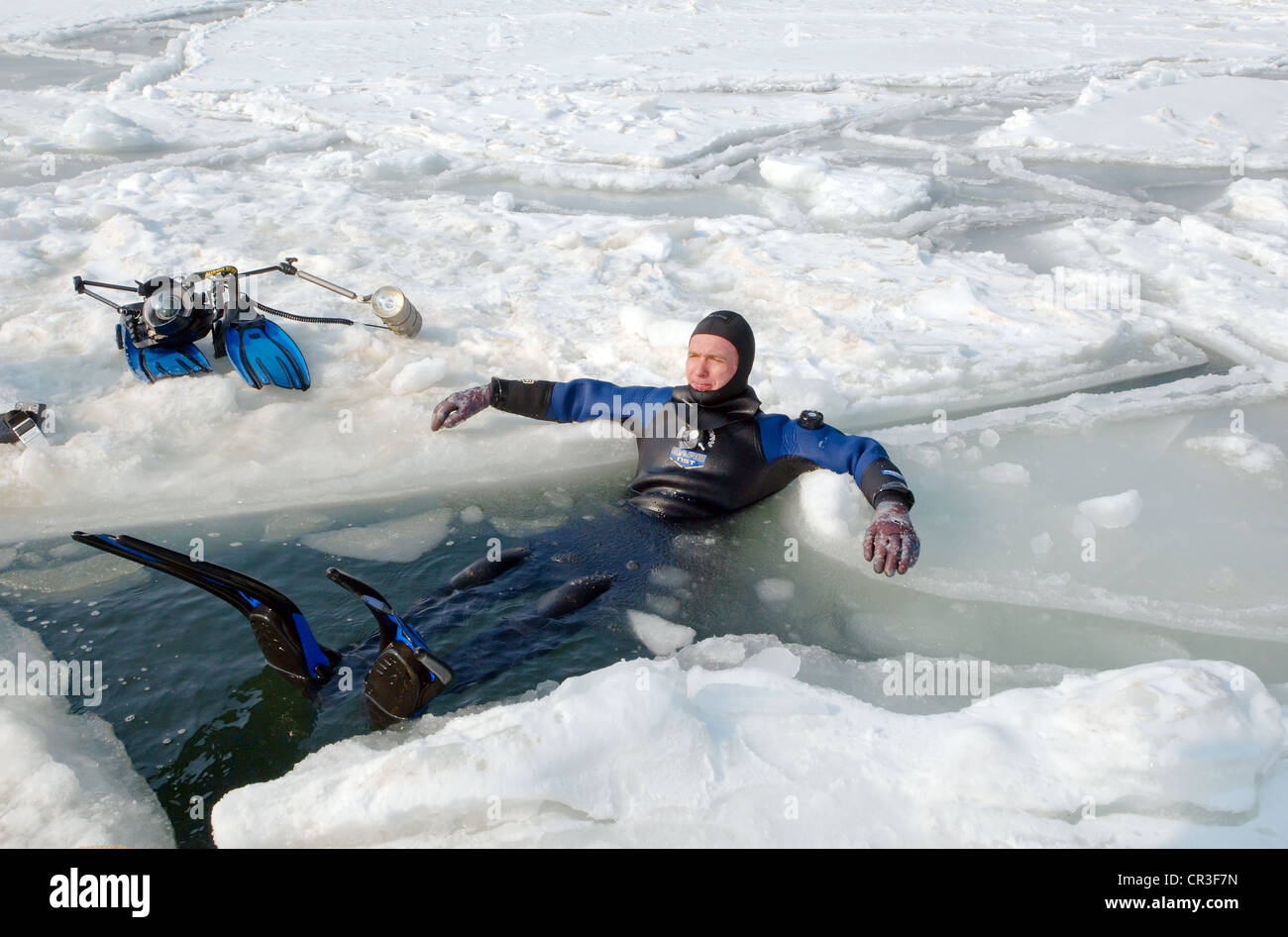 Diver, subglacial diving, ice diving, in the frozen Black Sea, a rare ...