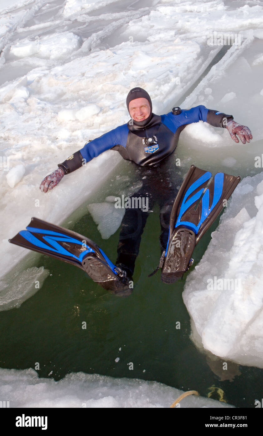 Diver, subglacial diving, ice diving, in the frozen Black Sea, a rare ...