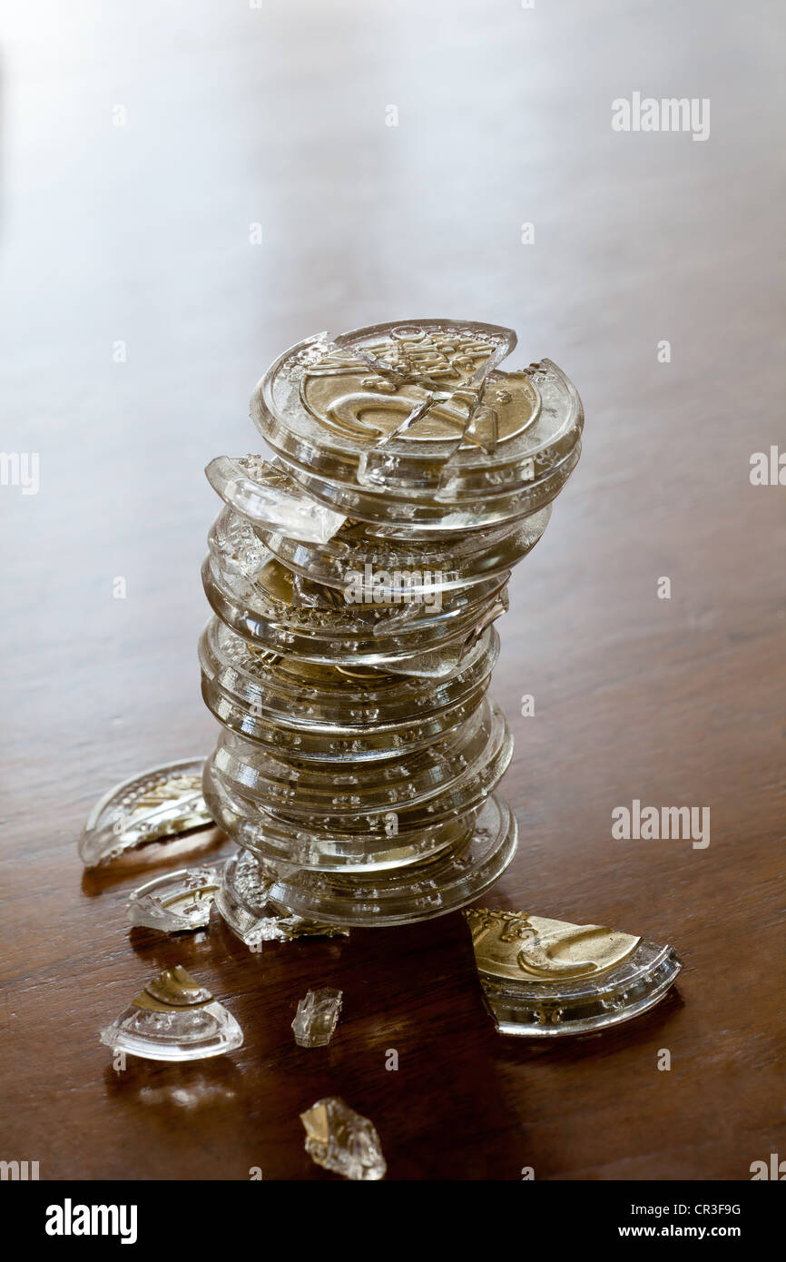 crumbling pile of glass 2 euro coins Stock Photo - Alamy