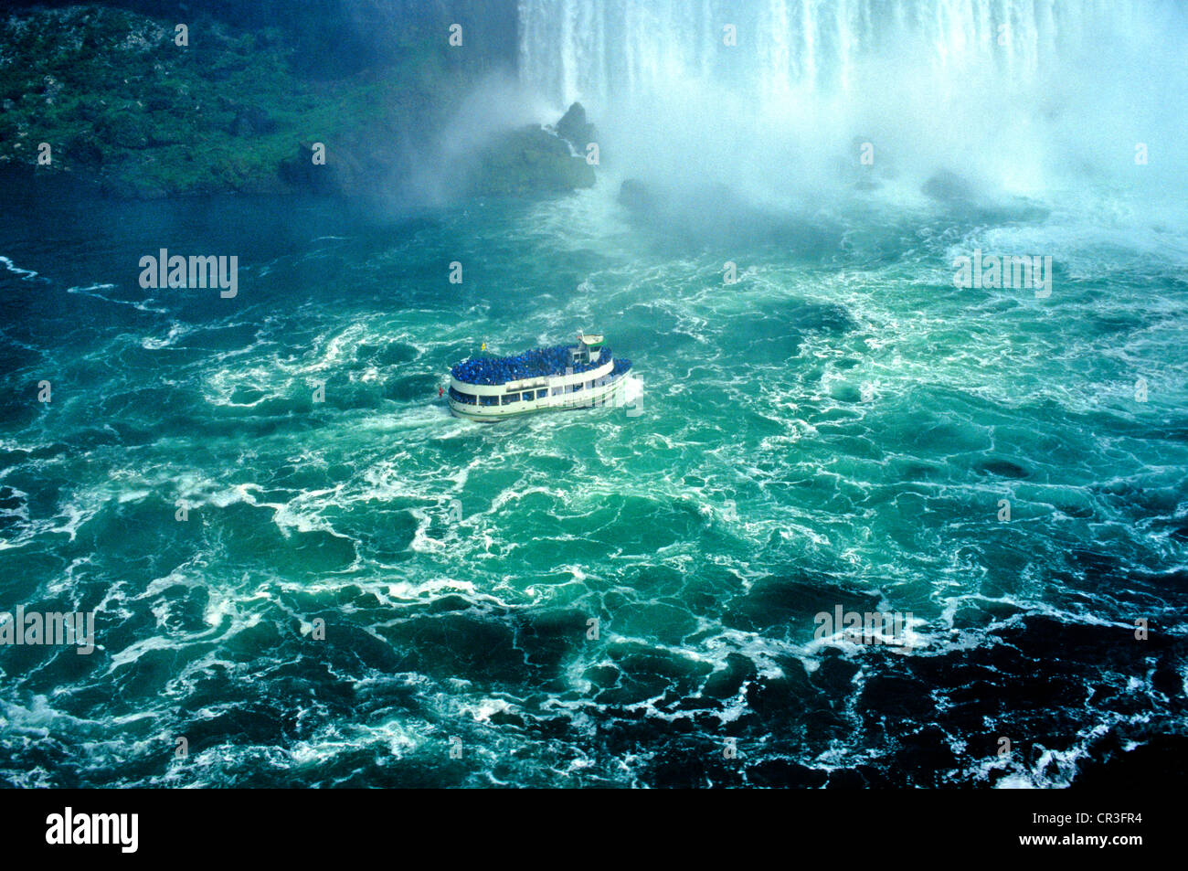 Canada, Ontario Province, Niagara, boat under Niagara Falls Stock Photo ...