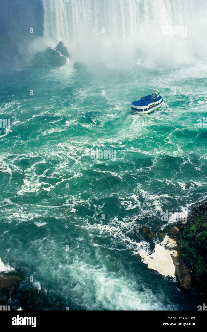 Canada, Ontario Province, Niagara, boat under Niagara Falls Stock Photo ...