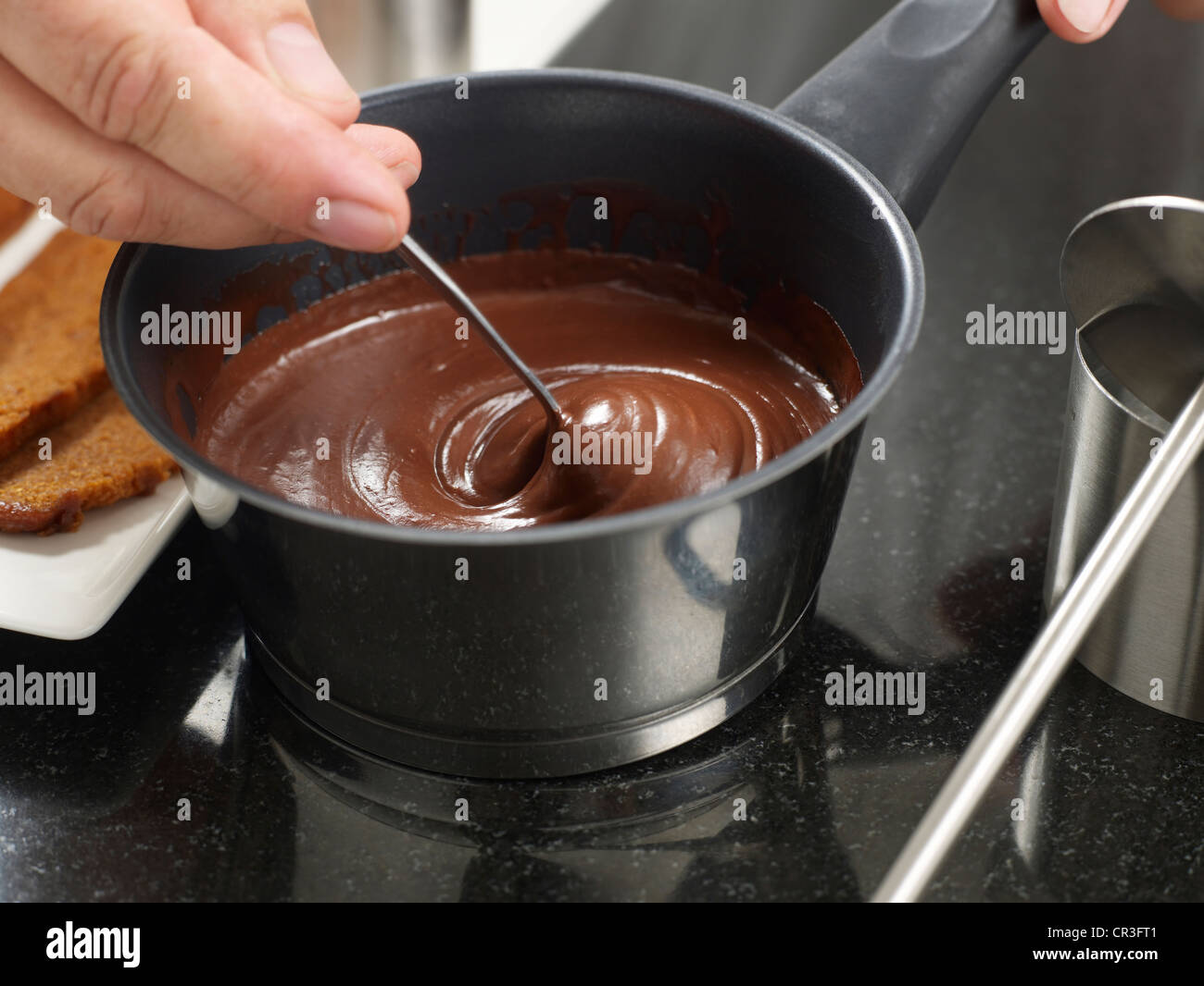 stirring melted chocolate Stock Photo - Alamy