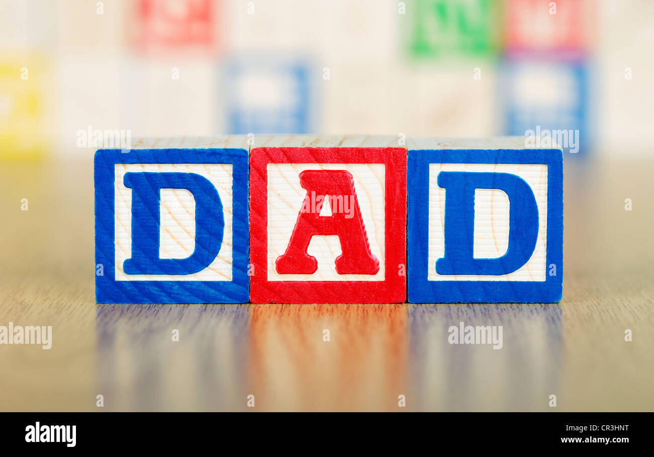 Dad Spelled Out in Alphabet Building Blocks Stock Photo - Alamy