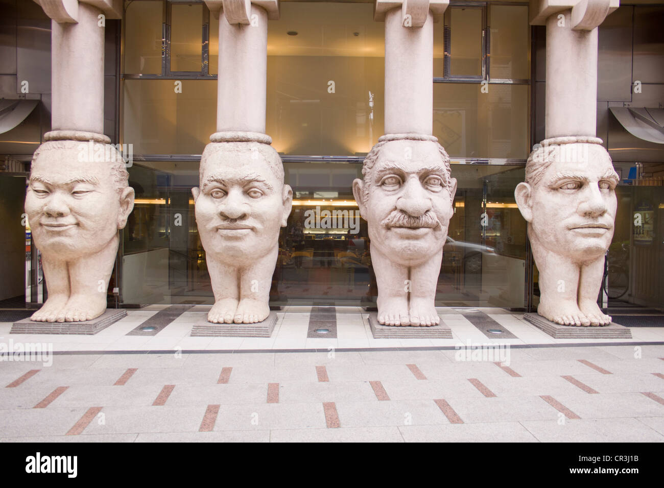 Stone statue face columns in Dōtonbori, Osaka, Japan Stock Photo - Alamy