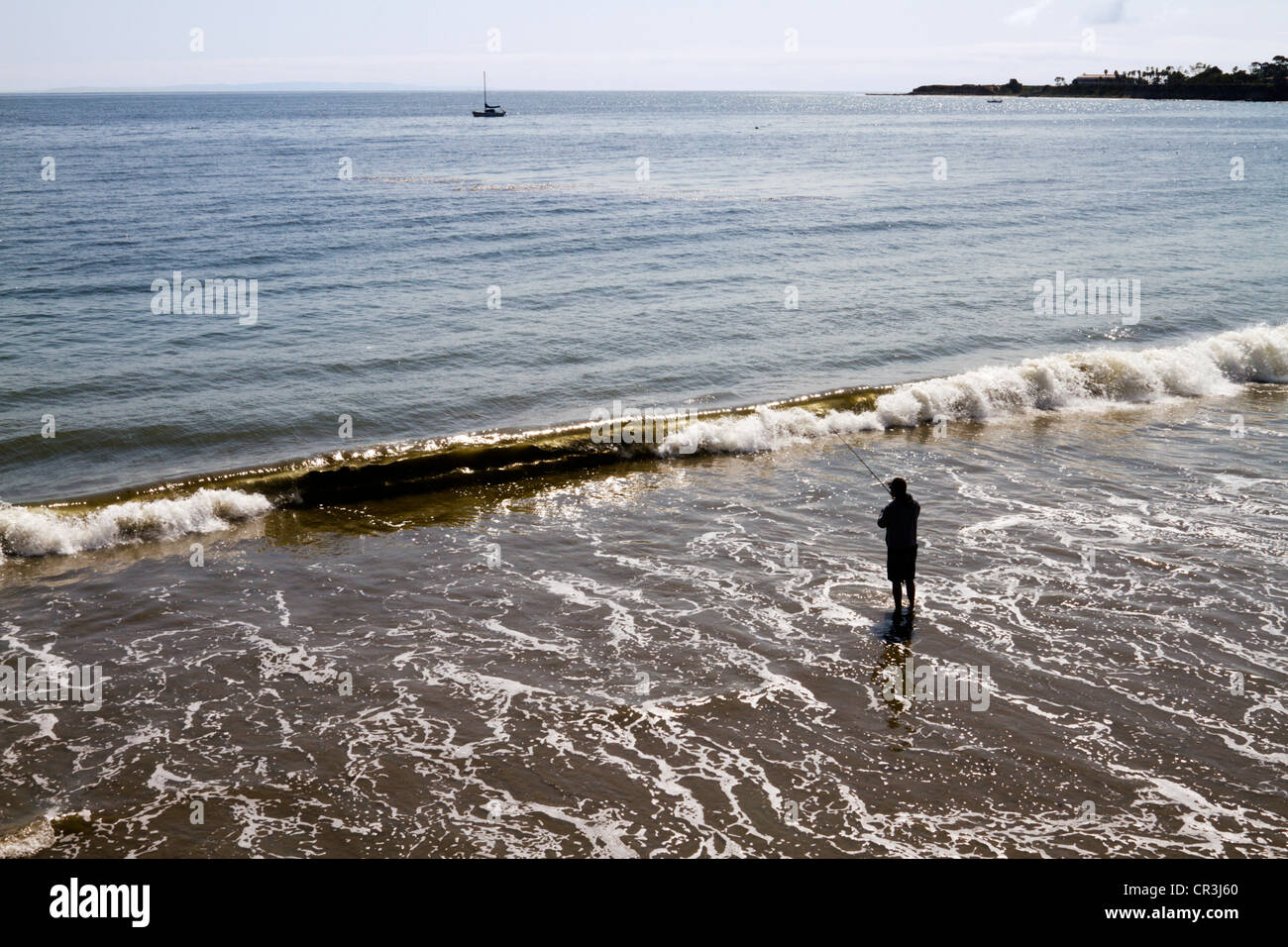 Man fishing in surf in Goleta California Stock Photo - Alamy