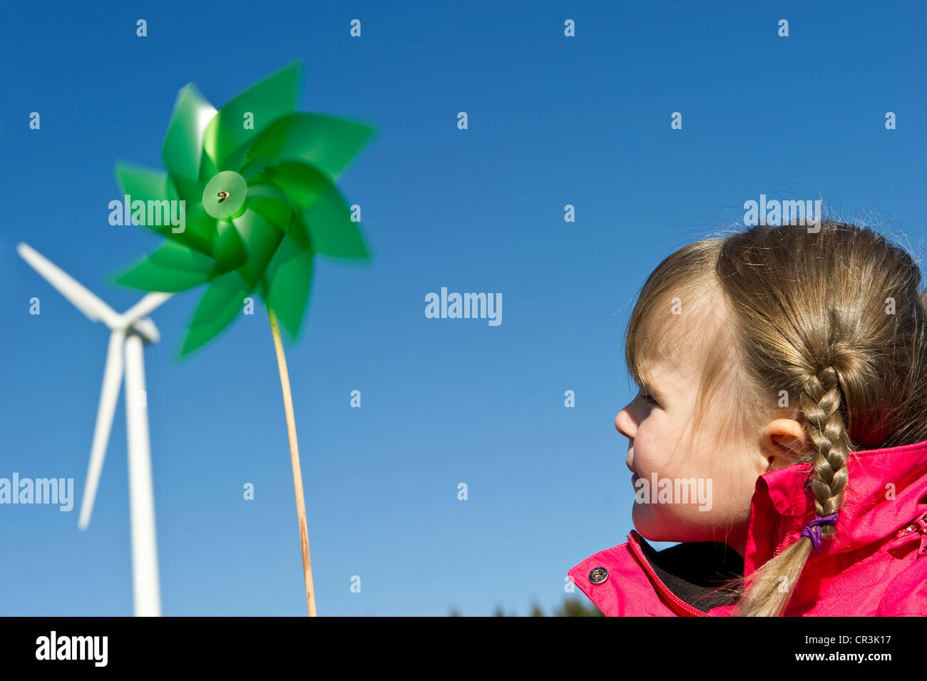Girl with a pinwheel hi-res stock photography and images - Alamy
