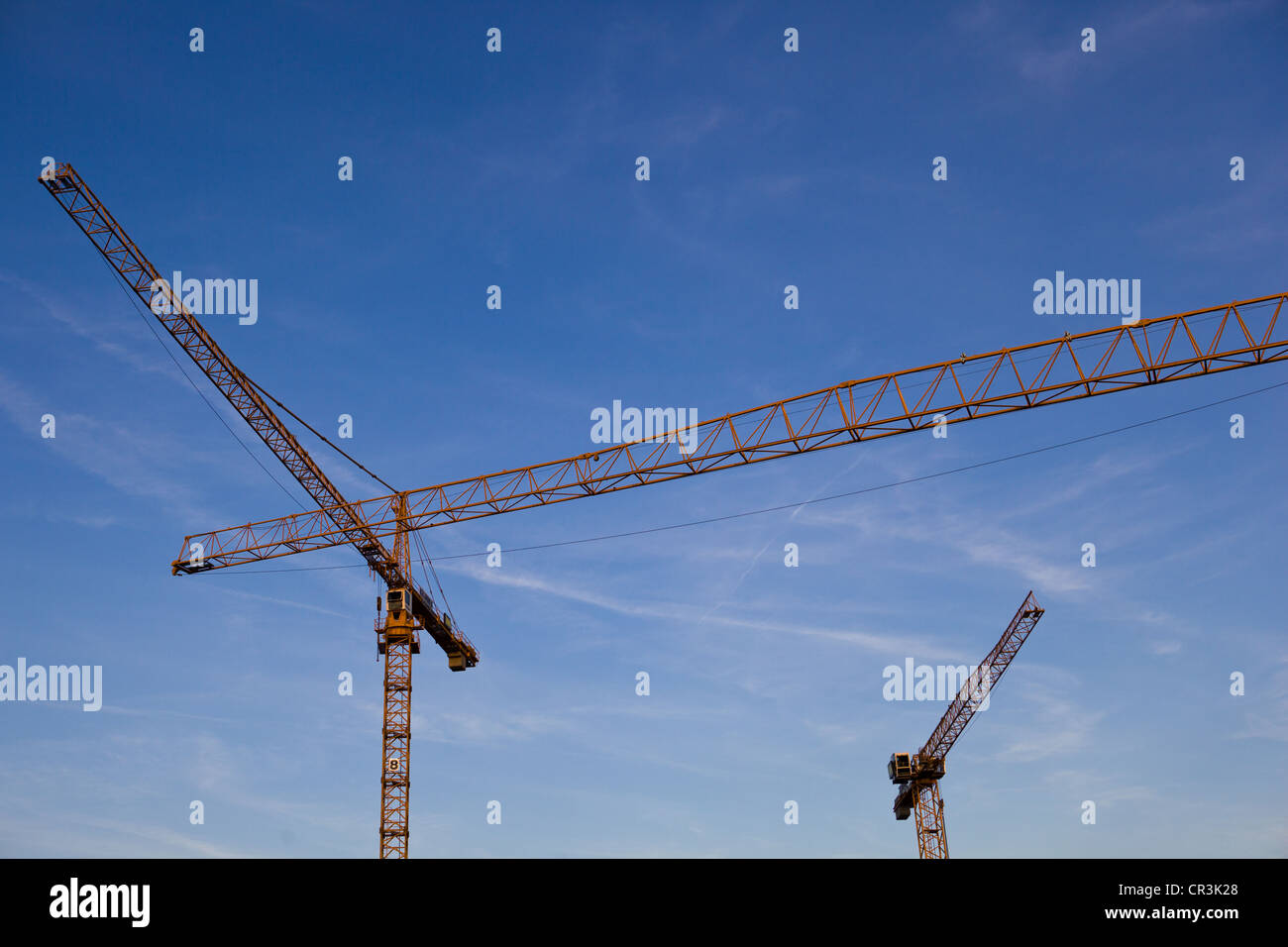 Construction site with two cranes Stock Photo - Alamy