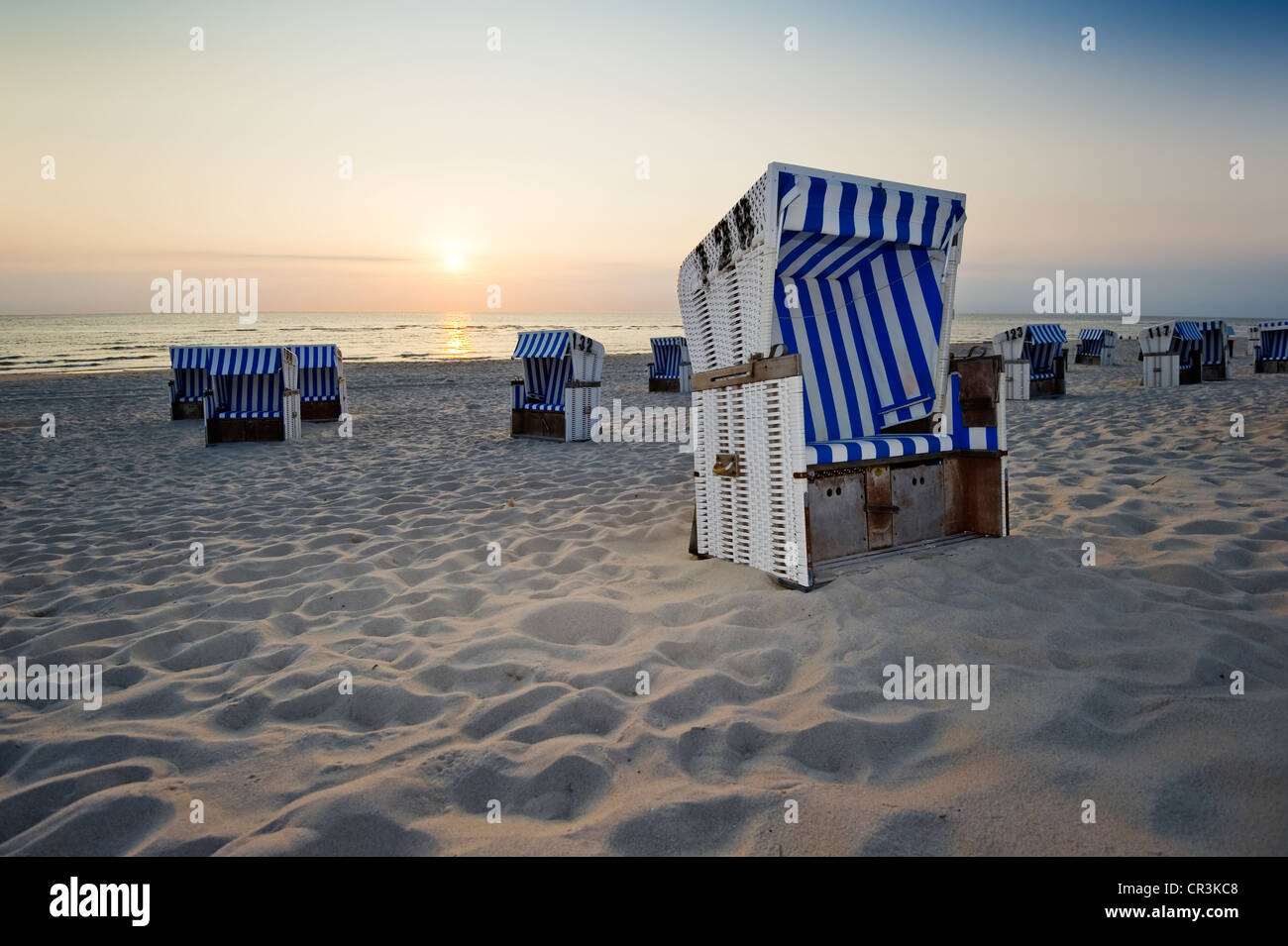 Roofed wicker beach chairs on the beach, Westerland, Sylt island ...