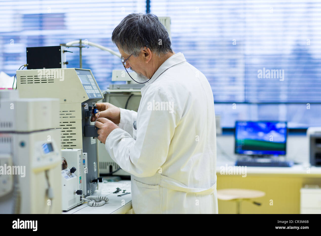 Chemist in chromatography lab Stock Photo - Alamy