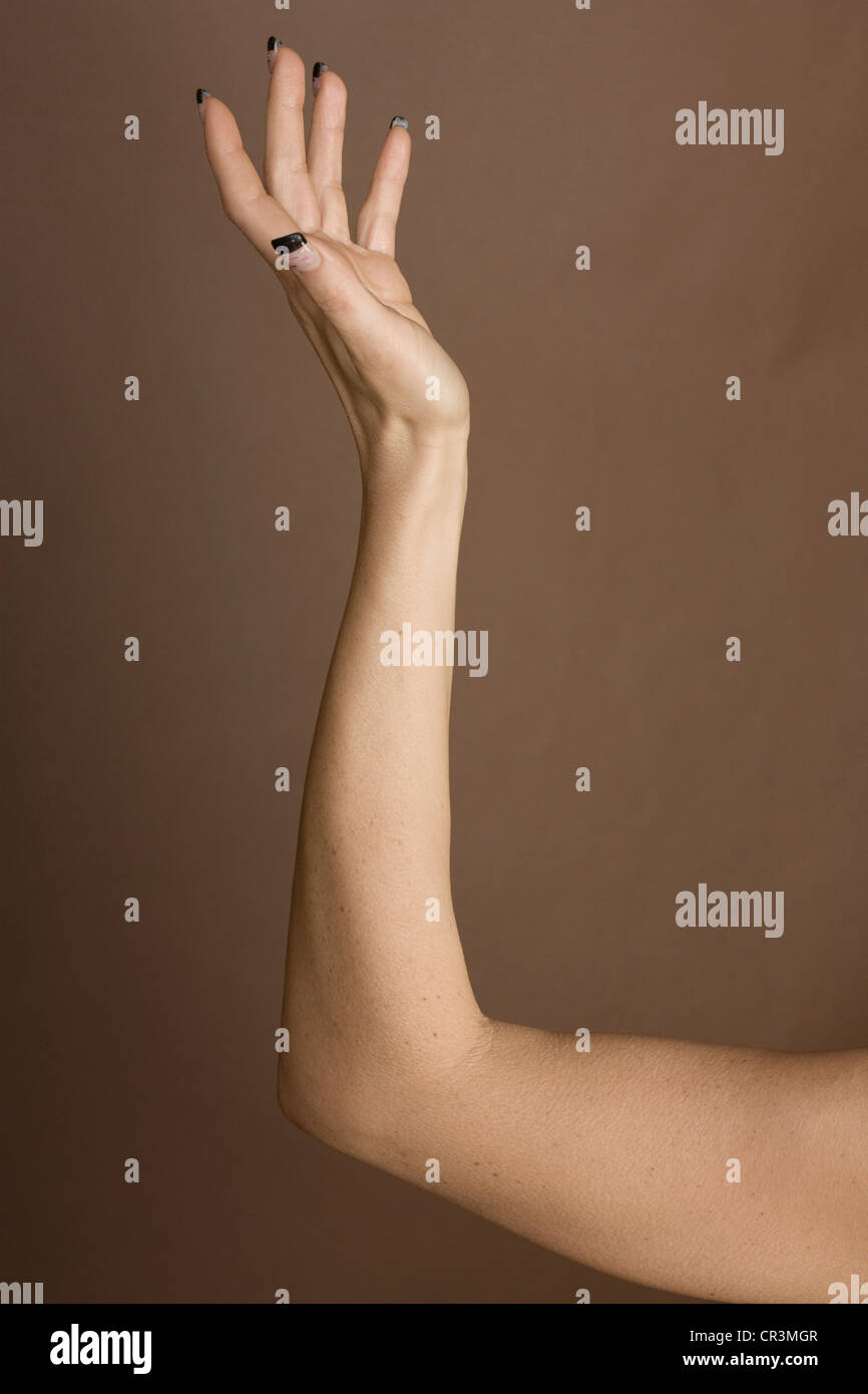 Arm of a woman Stock Photo - Alamy