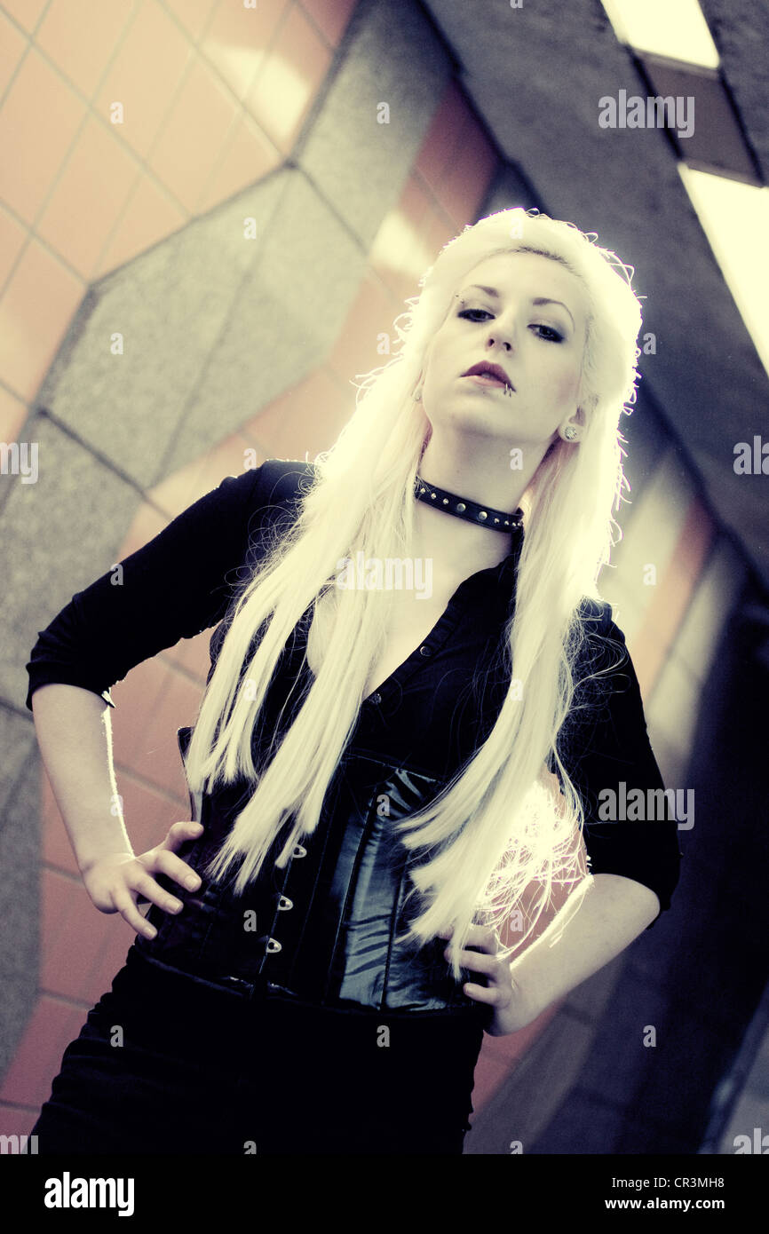 Woman, Punk, blond, standing, serious Stock Photo - Alamy