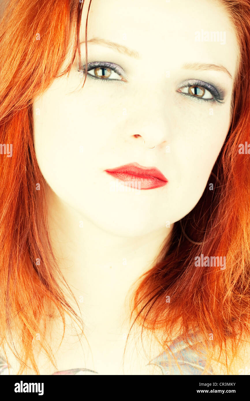 Woman, red hair, face, serious Stock Photo - Alamy