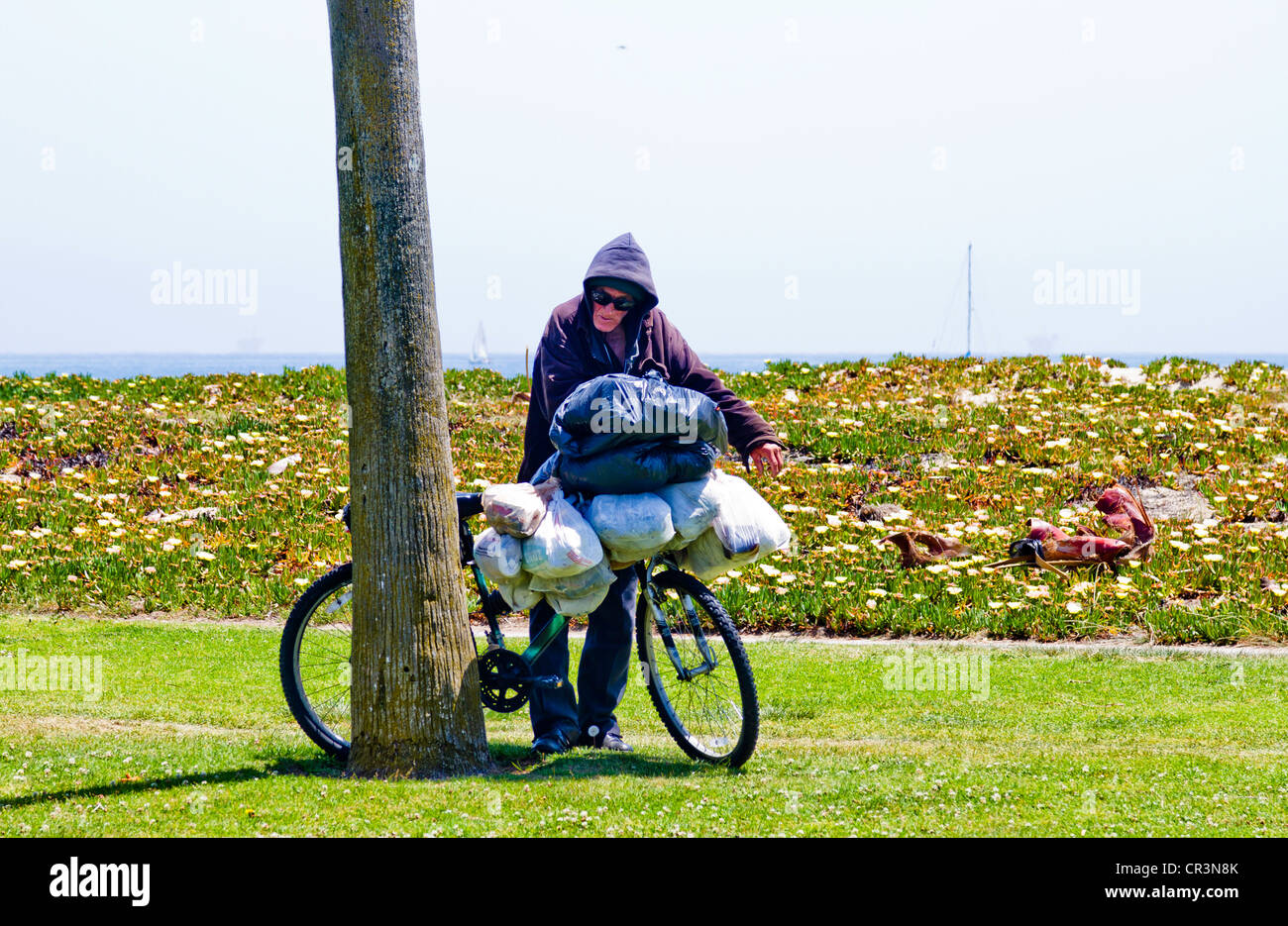 Homeless man with bicycle at beach in "Santa Barbara" California Stock ...