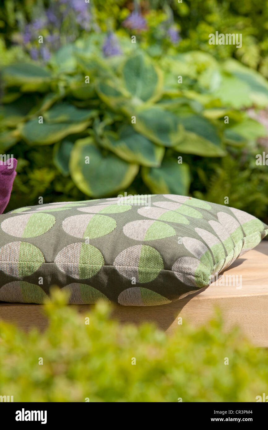 Garden seating with cushions, England, UK Stock Photo - Alamy