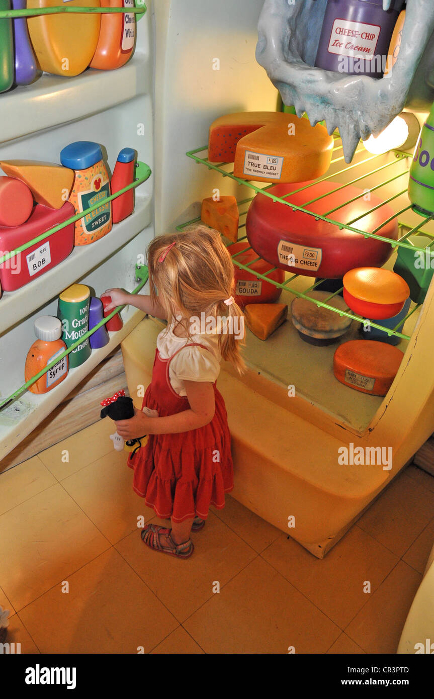 Little girl enjoys exploring Minnie Mouse's refrigerator full of cheese ...