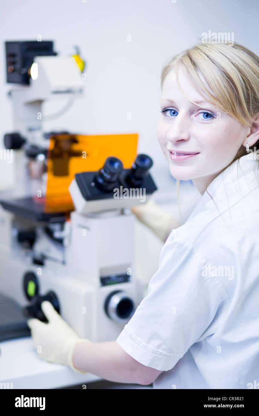 portrait of a female researcher doing research in a lab (color toned ...