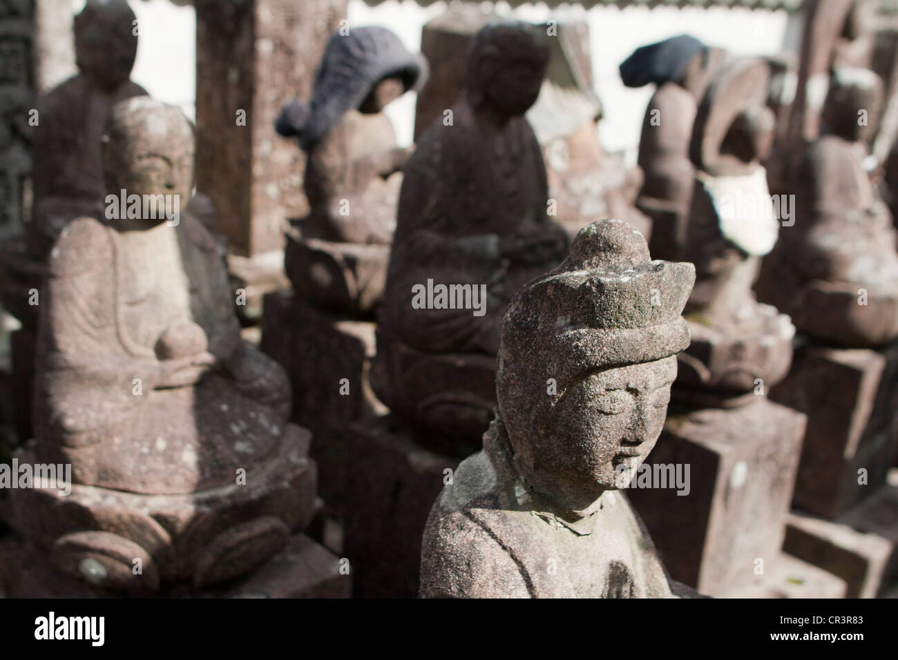 Japanese stone statues Stock Photo - Alamy