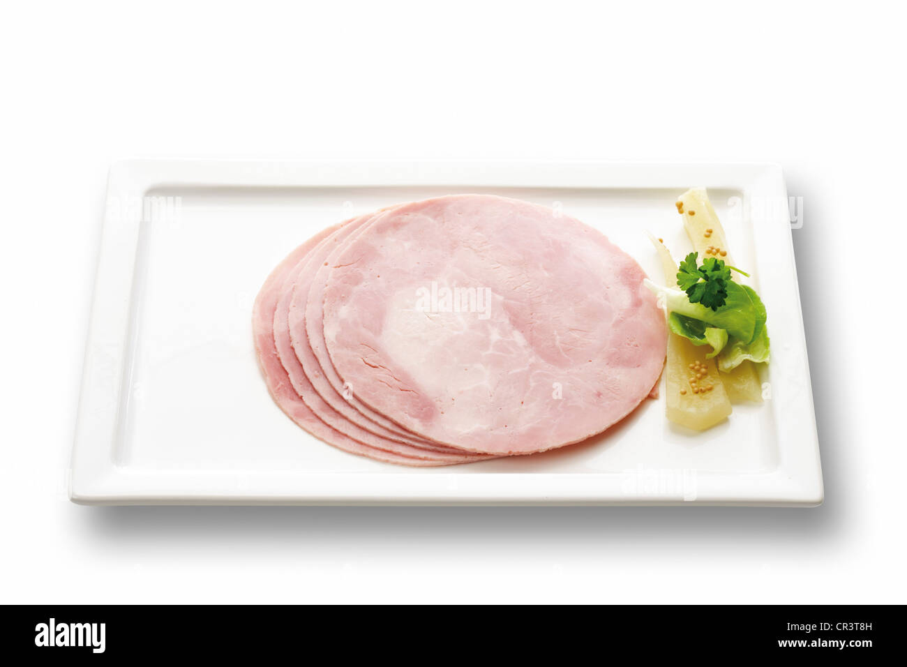 Slices of cooked ham on a plate Stock Photo - Alamy