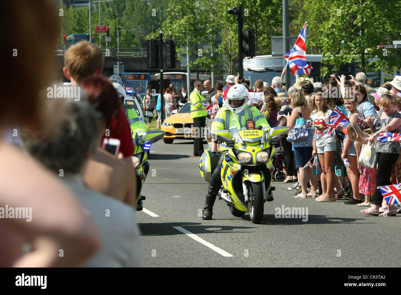 Olympic relay vehicles hi-res stock photography and images - Alamy