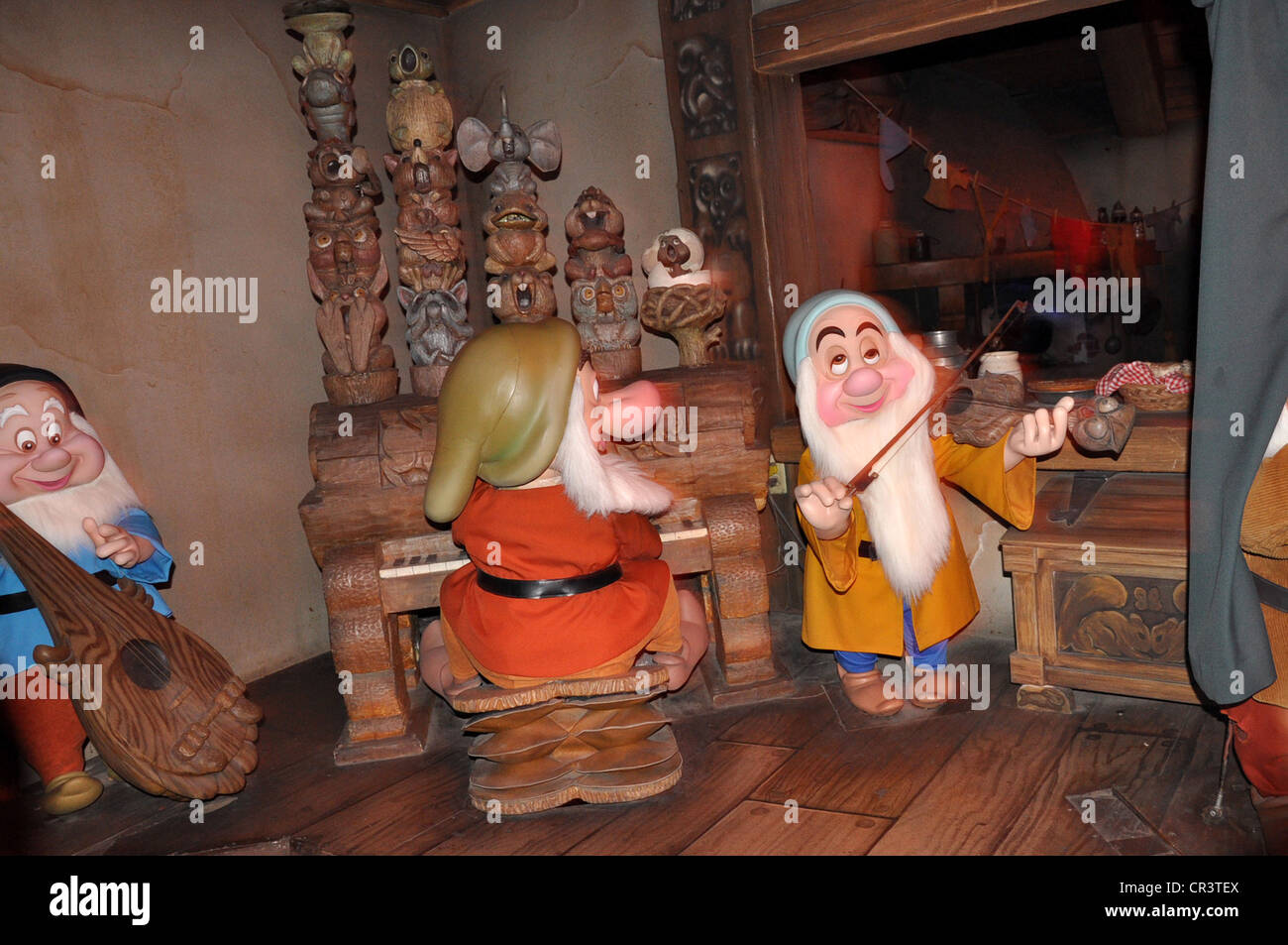 Dwarfs play music in Snow White's Scary Adventure attraction at ...