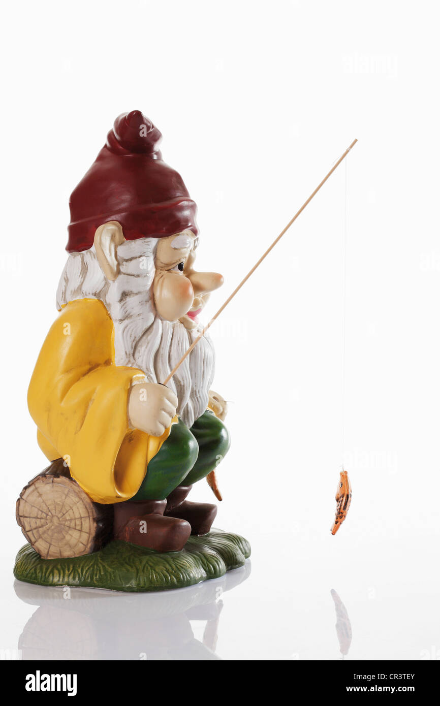 Garden gnome with a fish on its hook Stock Photo - Alamy
