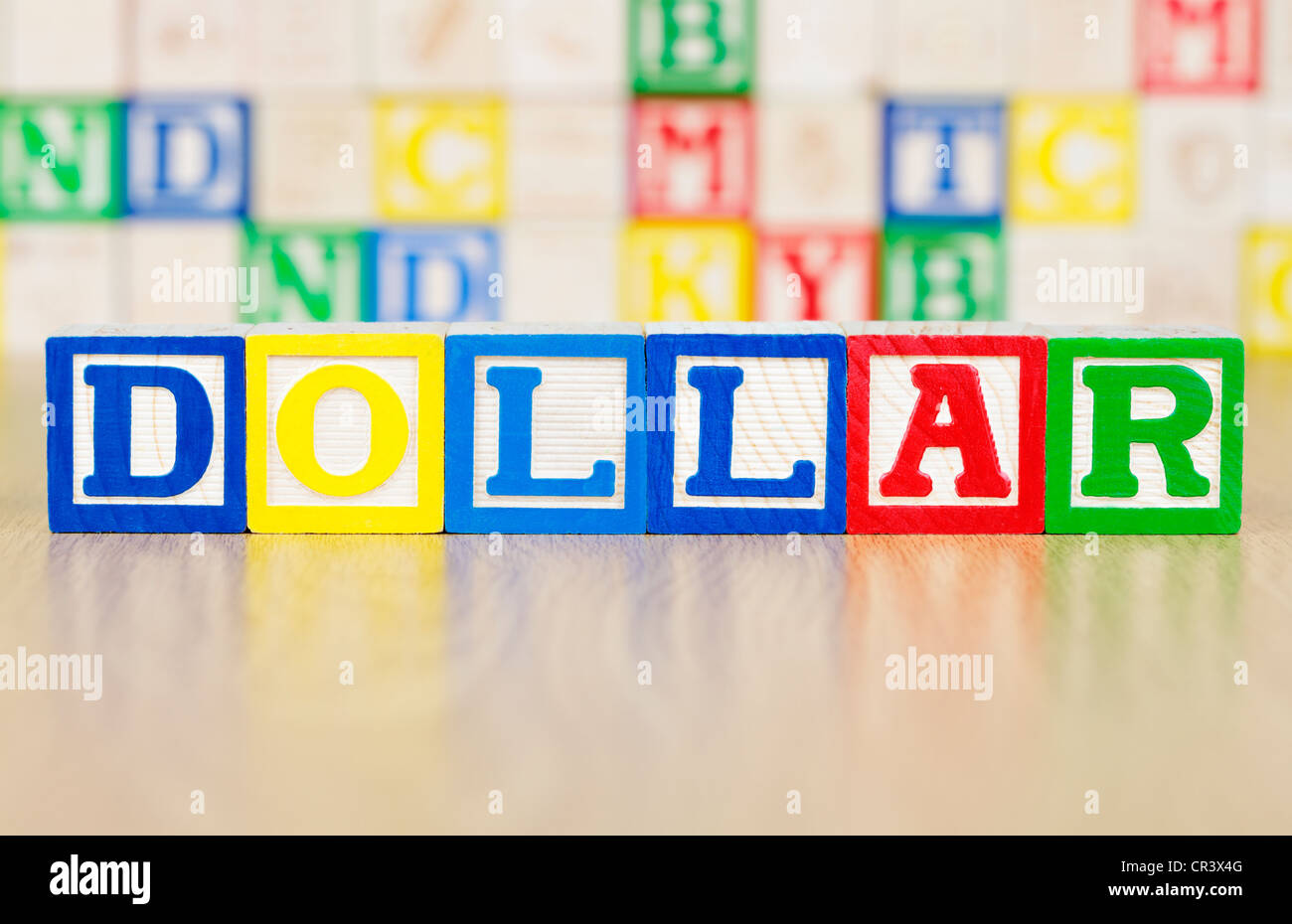 DOLLAR Spelled Out in Alphabet Building Blocks Stock Photo - Alamy