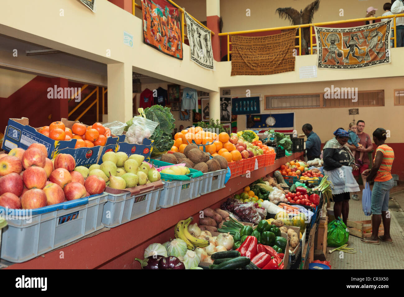 Stalls of fresh local produce displayed for sale in indoor Municipal ...