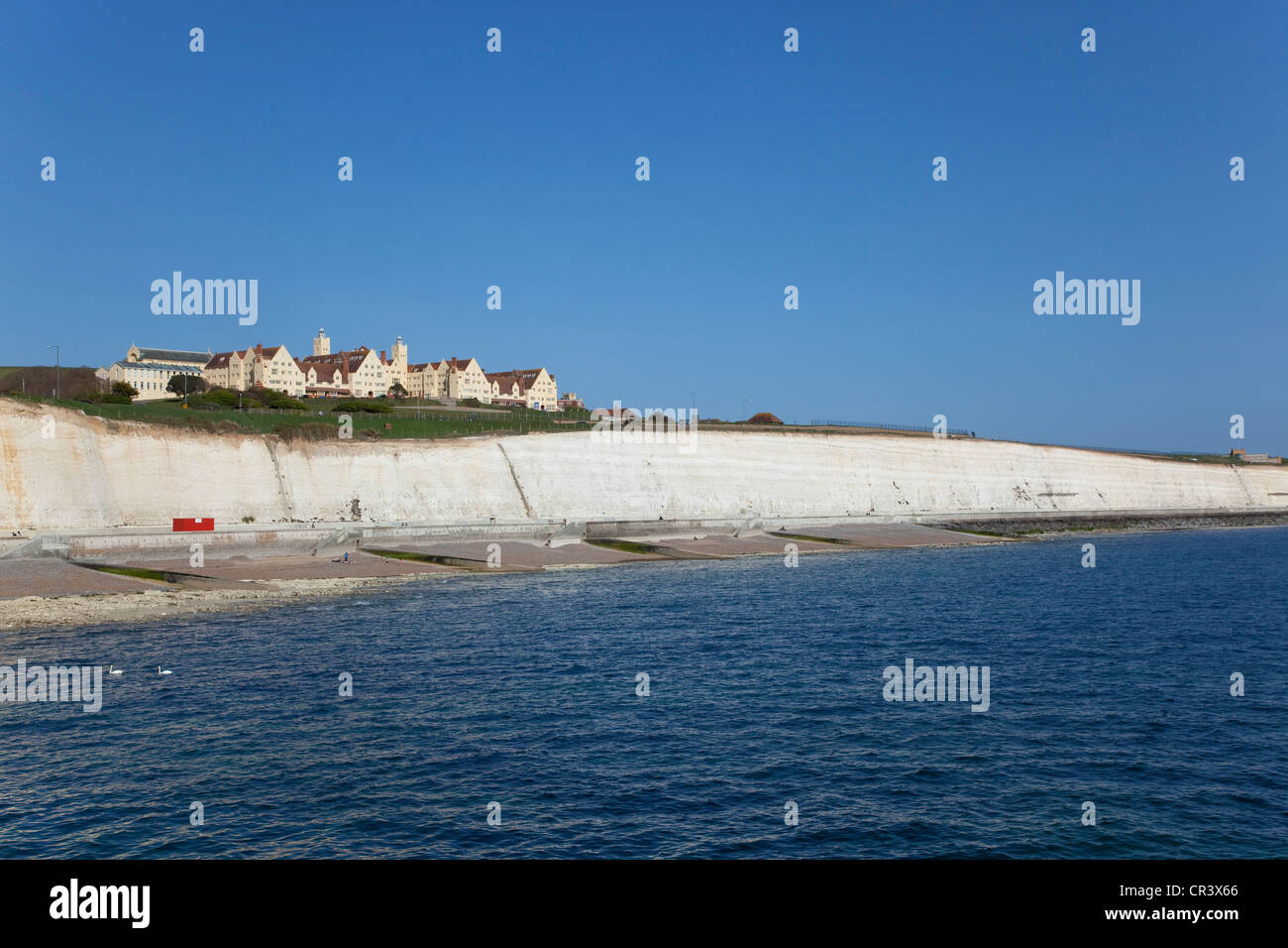 England, East Sussex, Brighton, white cliff coastline with Roedean ...