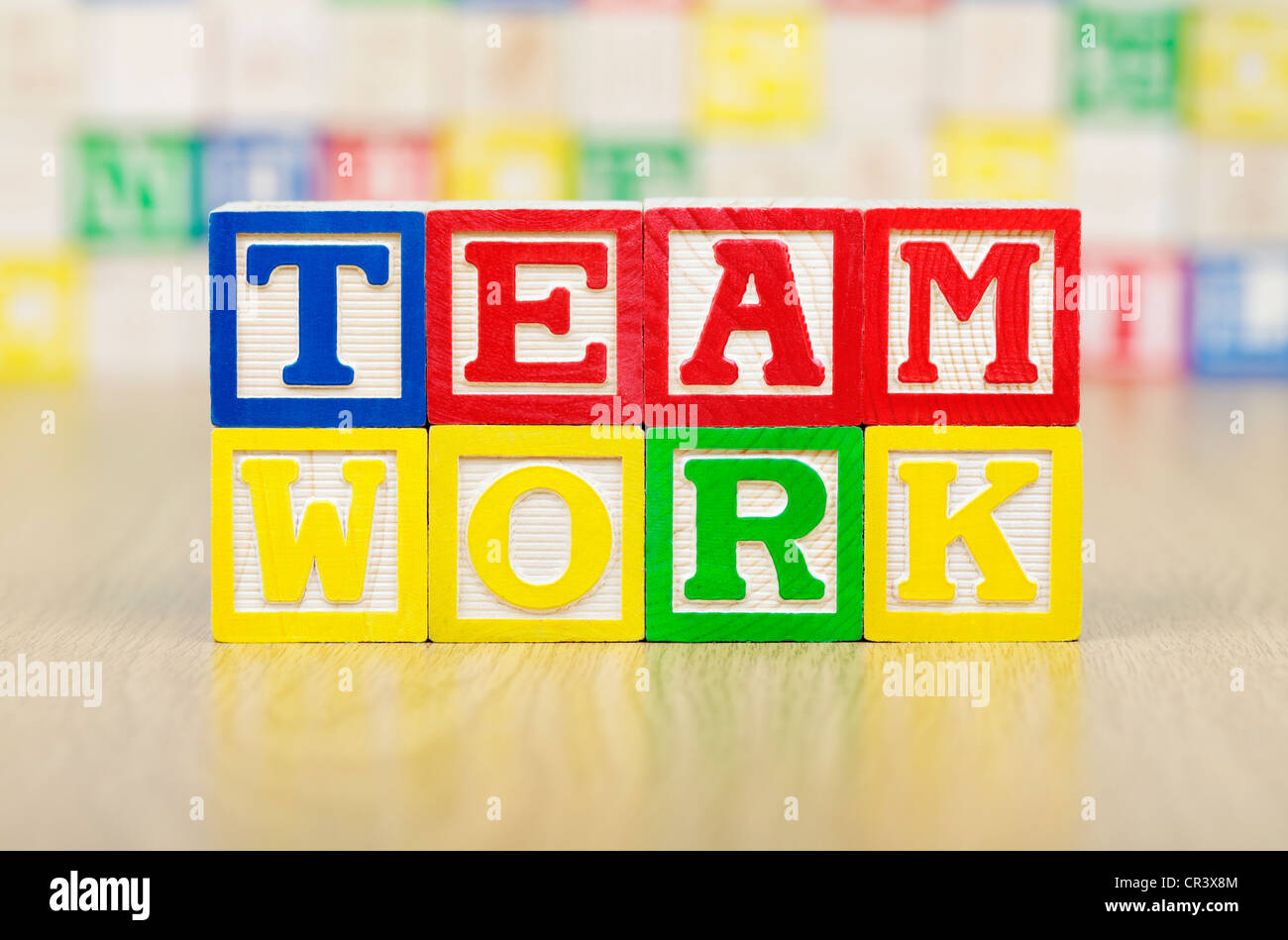Team Work Spelled Out in Alphabet Building Blocks Stock Photo - Alamy
