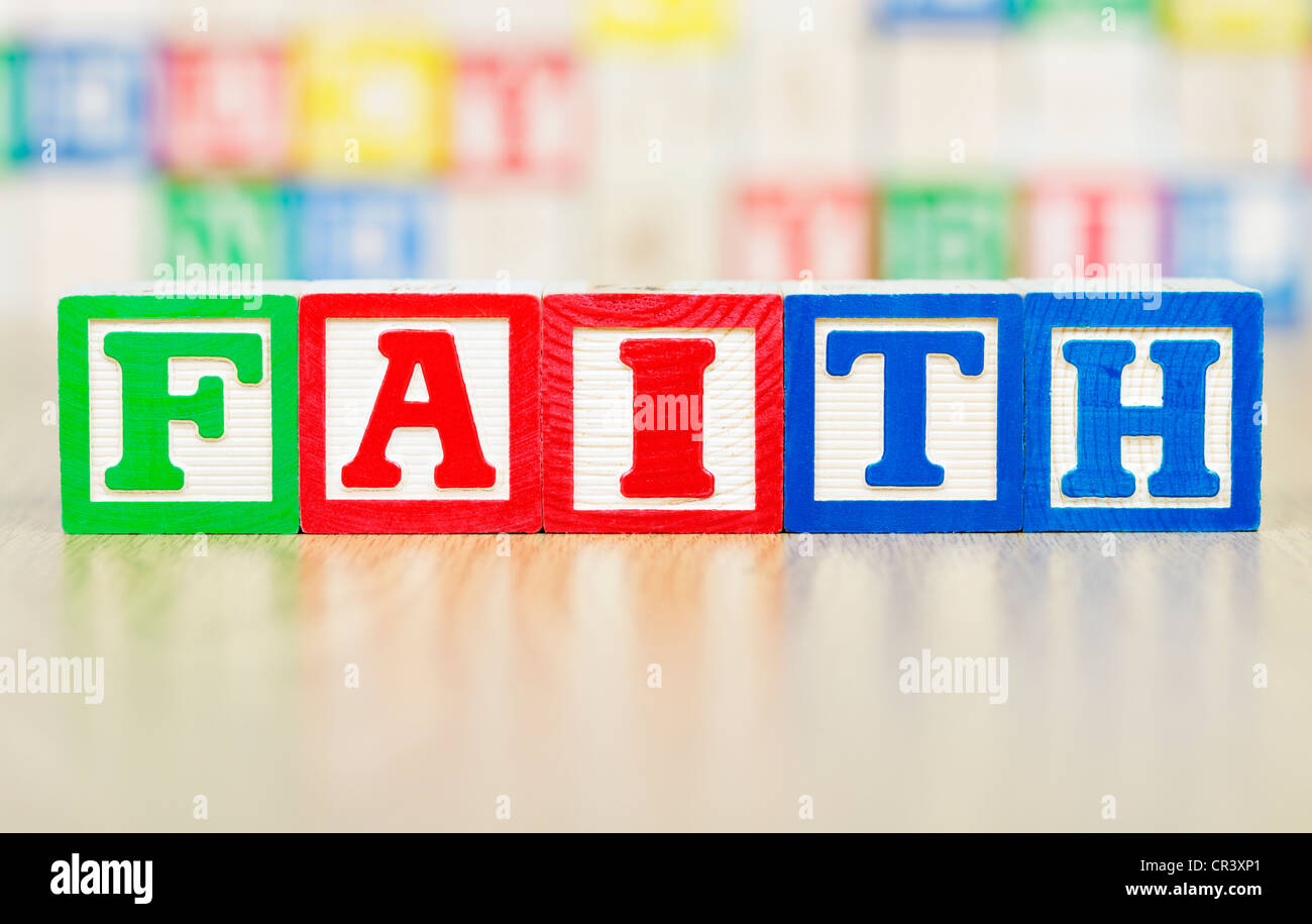 Faith Spelled Out in Alphabet Building Blocks Stock Photo - Alamy
