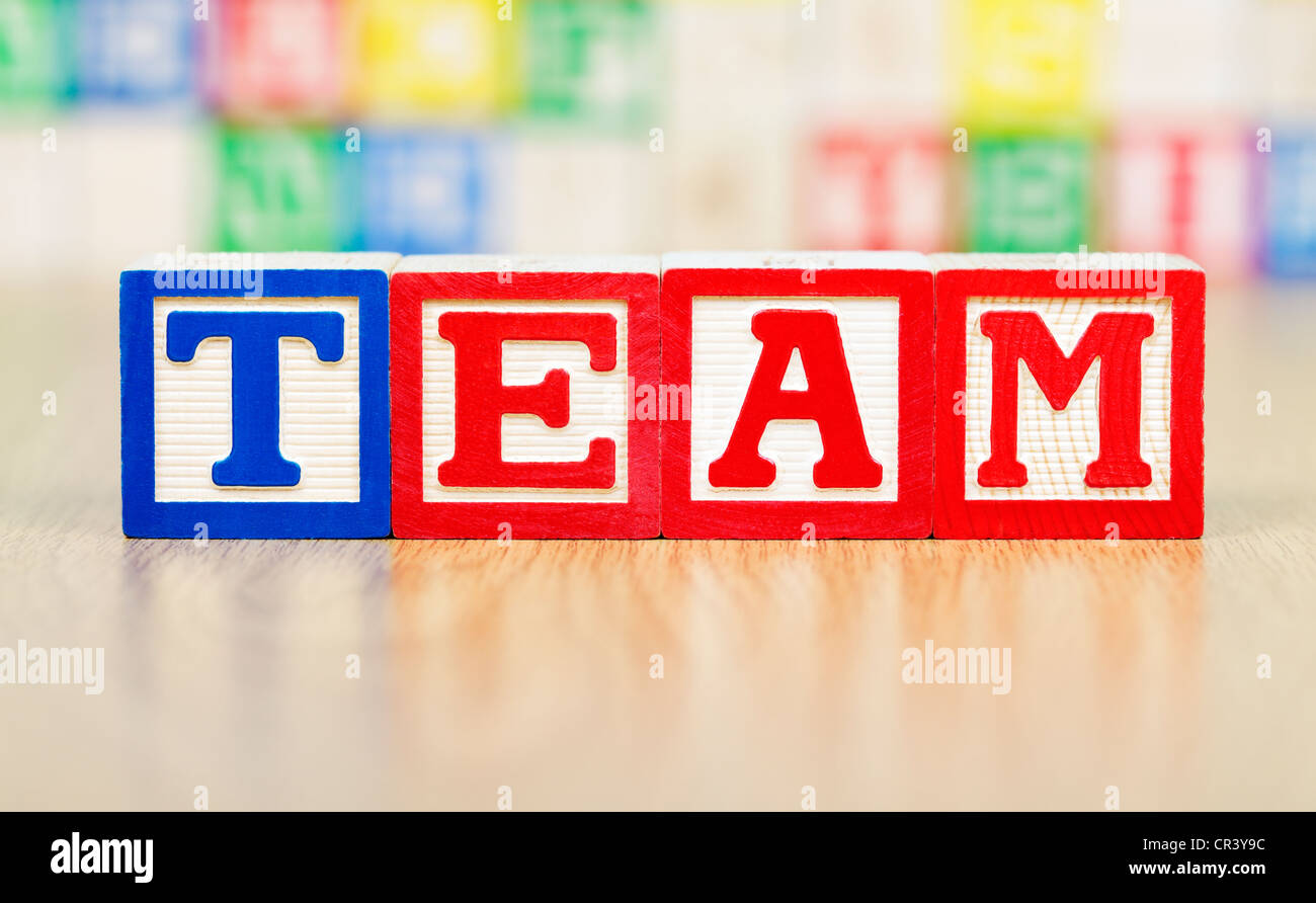 Team Spelled Out in Alphabet Building Blocks Stock Photo - Alamy