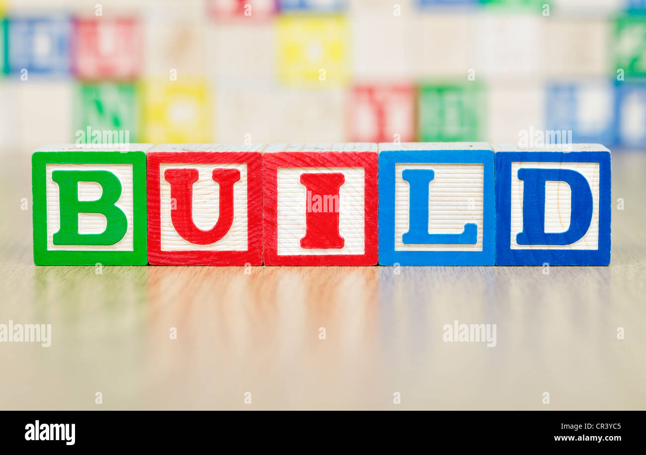 Build Spelled Out in Alphabet Building Blocks Stock Photo - Alamy