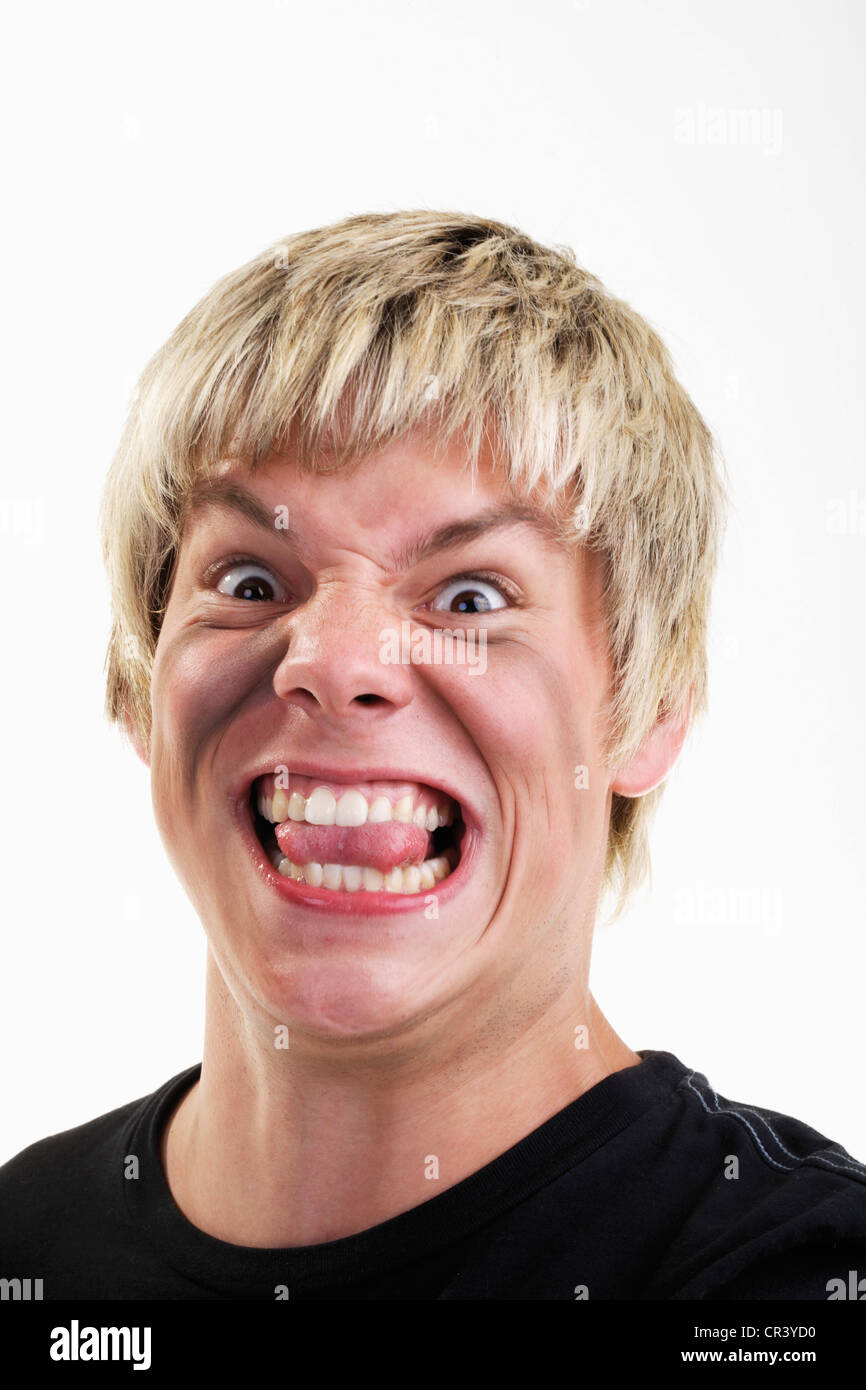 Young man with crazy expression Stock Photo - Alamy