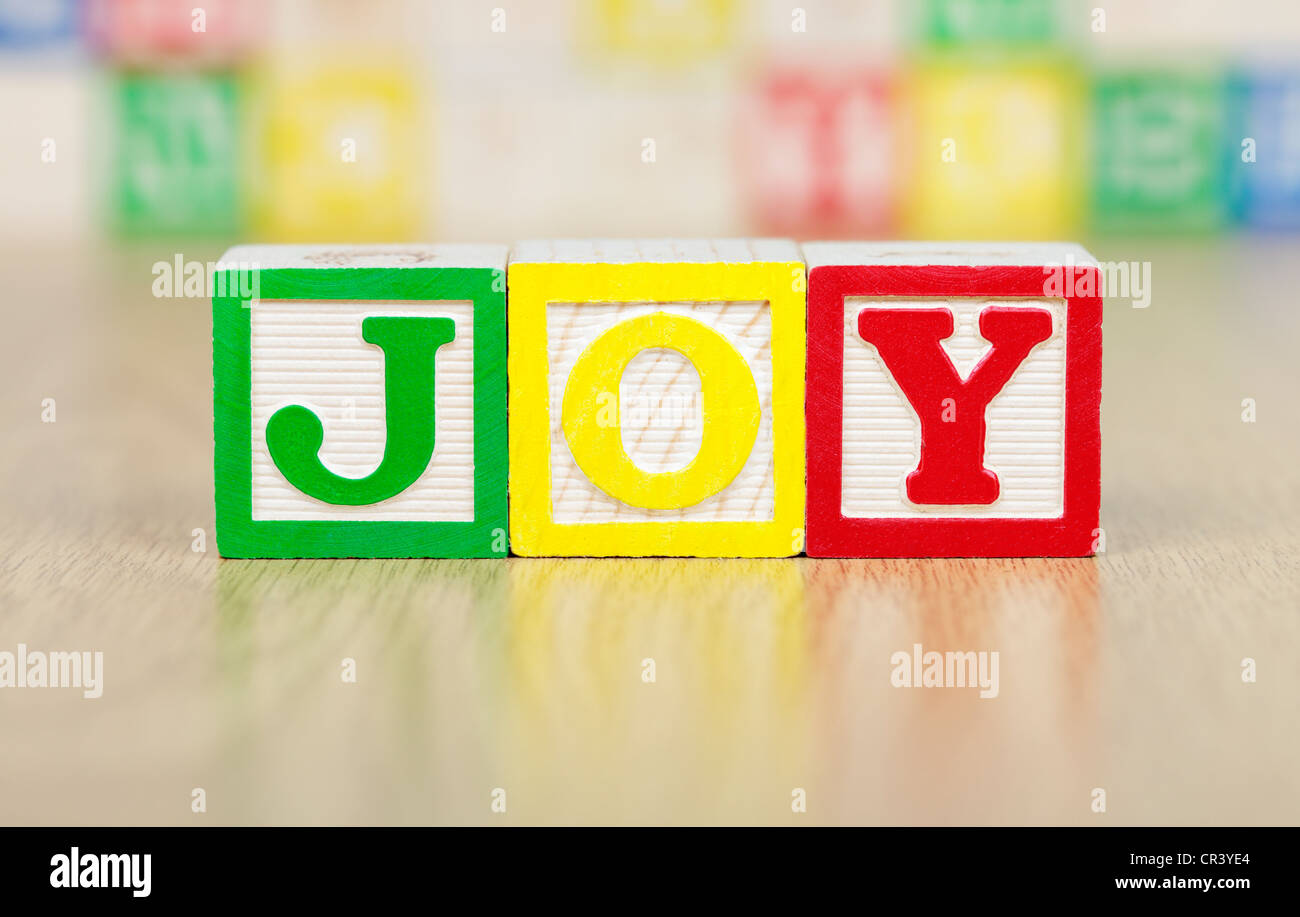 JOY Spelled Out in Alphabet Building Blocks Stock Photo - Alamy