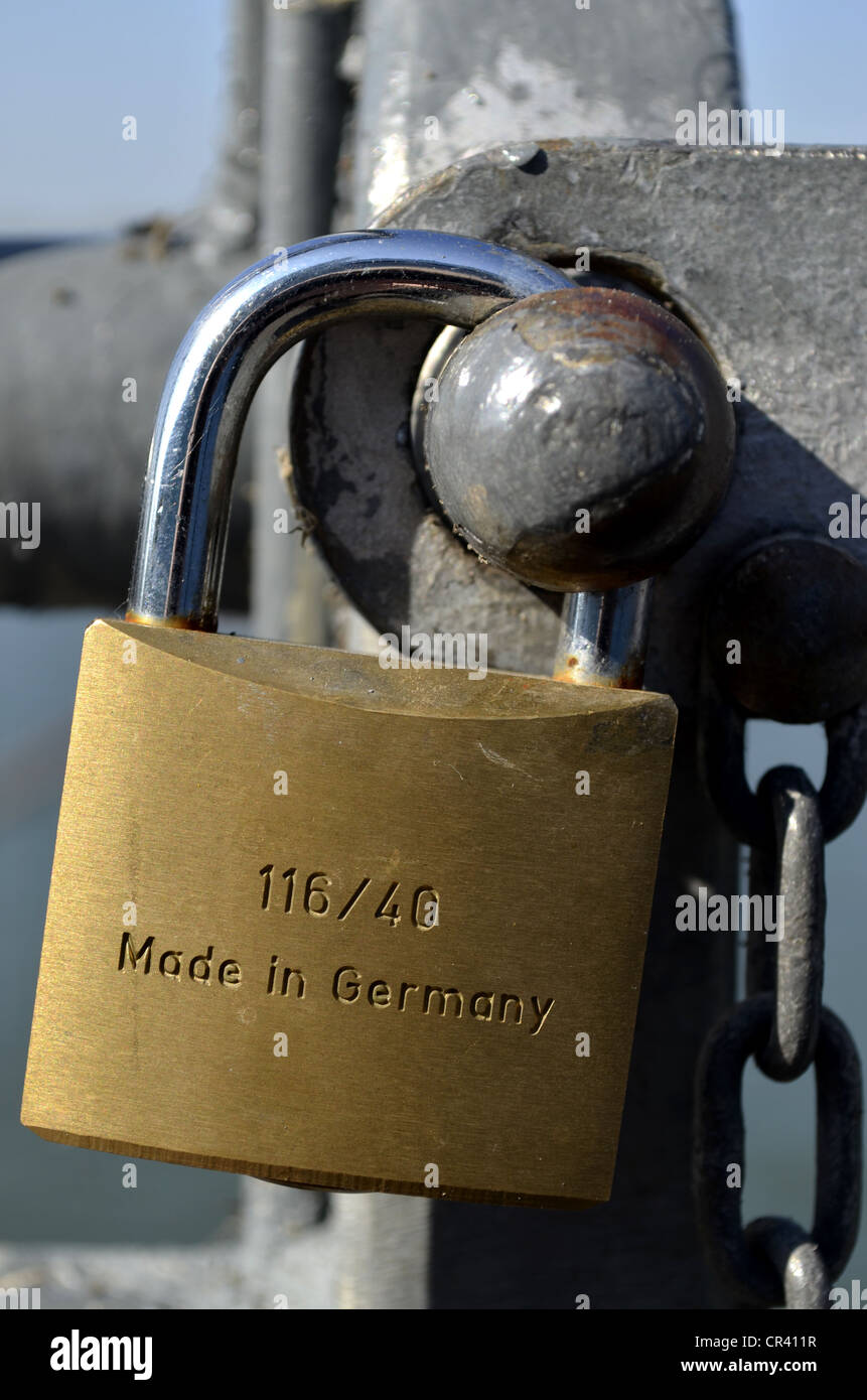 Padlock, Made in Germany, at a barrier fence along the Rhine Promenade ...