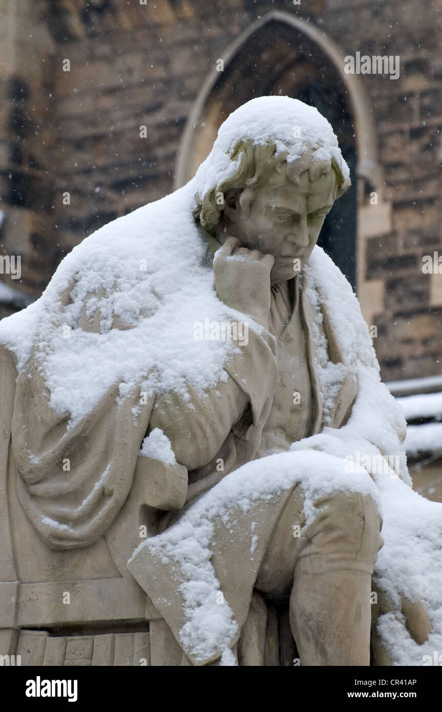Snow covered statue of Dr Johnson in the Market Square Lichfield in ...