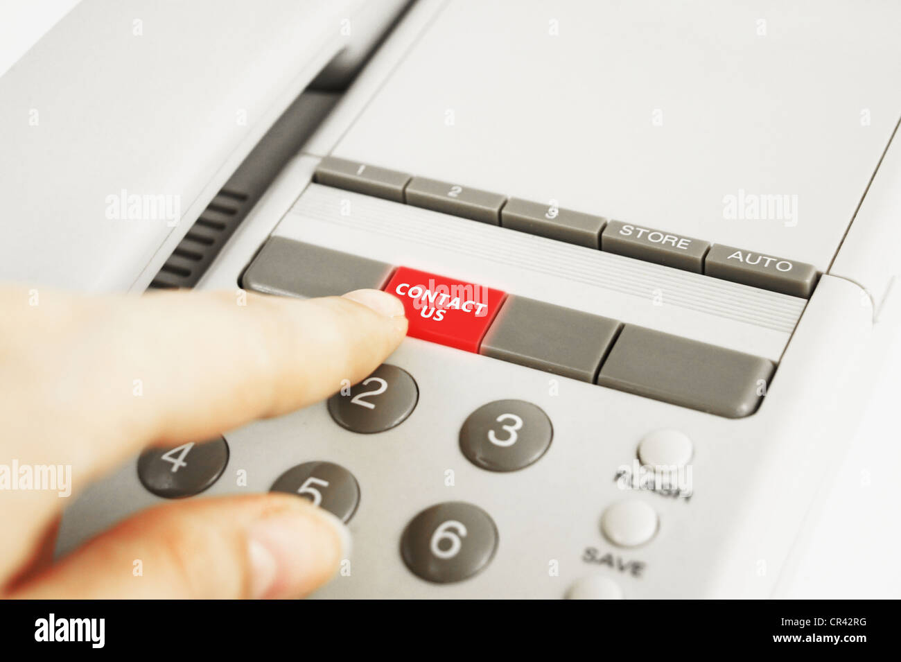 Contact us button on phone keypad Stock Photo - Alamy