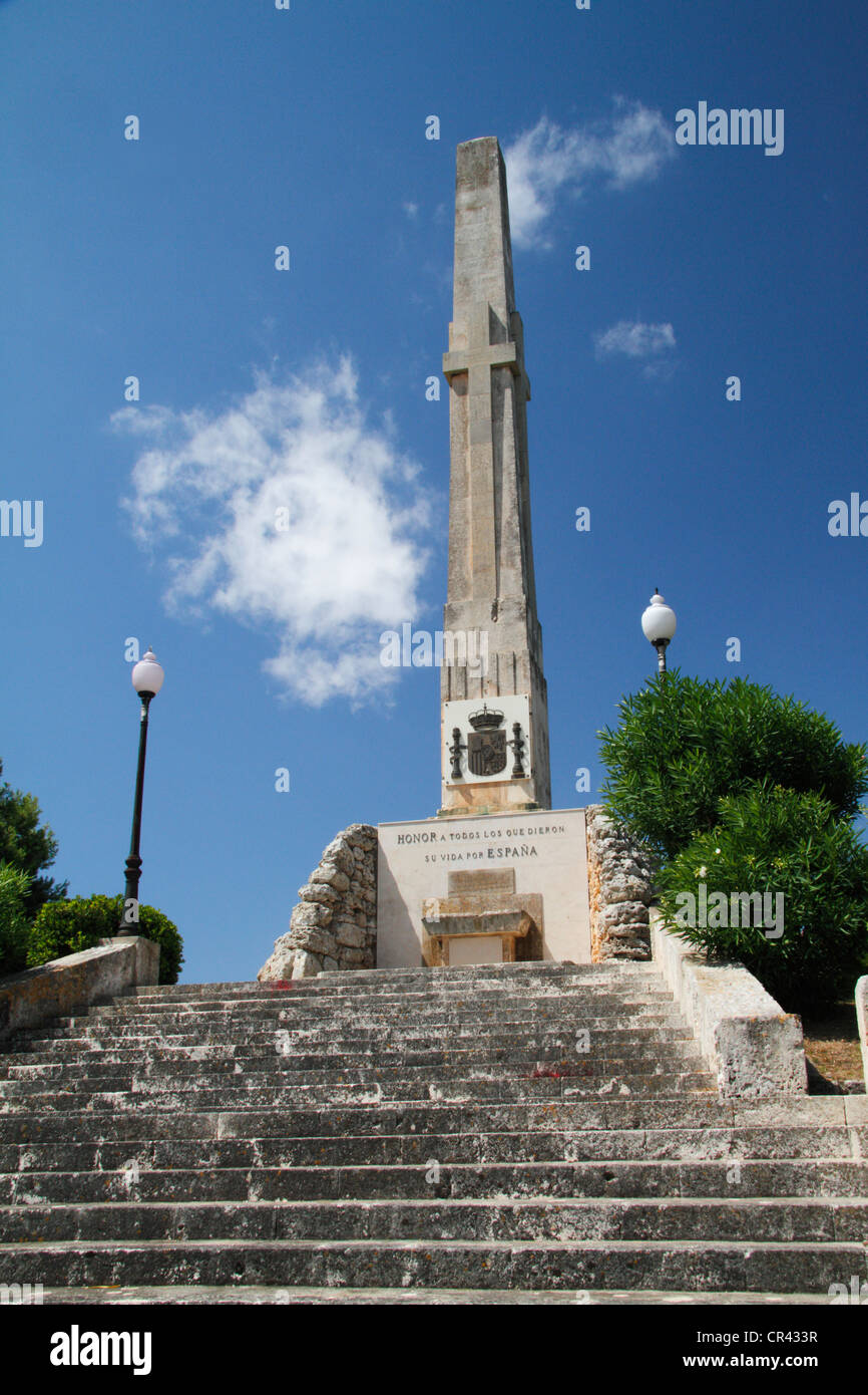 Monument with a cross and lettering "Honor A Todos Los Que Dieron Su ...