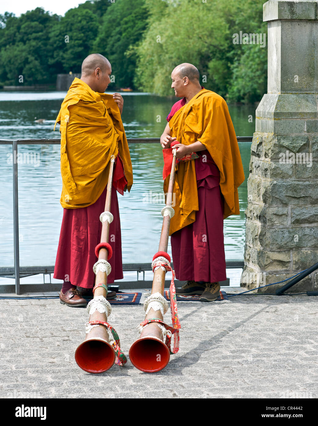 Tibetan monks performing music and dance Stock Photo - Alamy